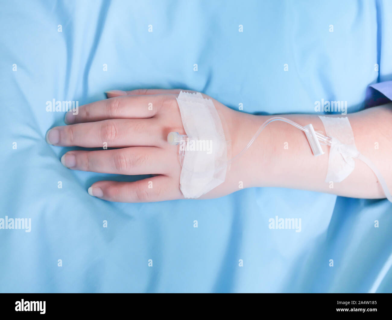 patient in hospital with saline intravenous (iv), saline into the body ...