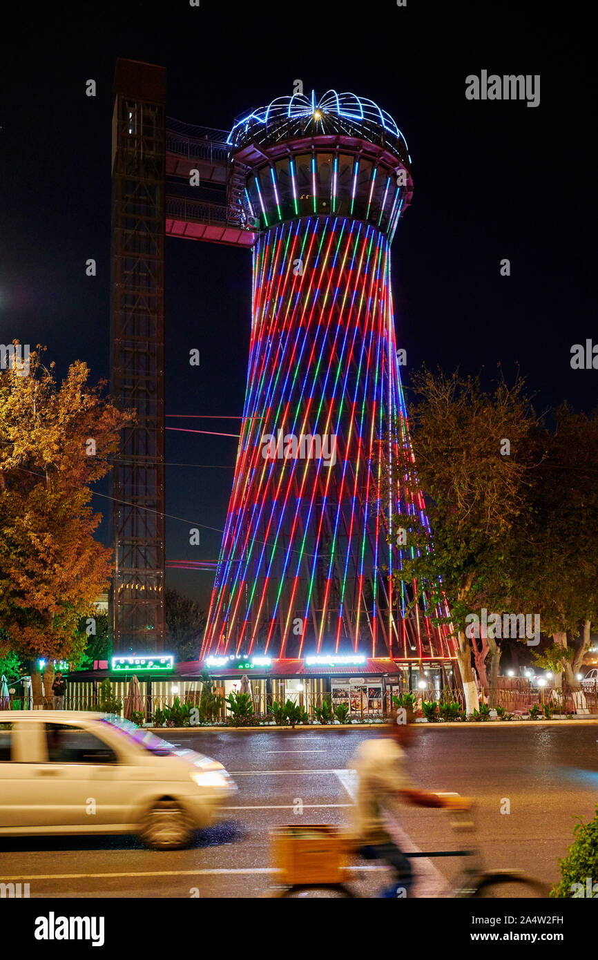 colorful illuminated Shukhova Water Tower, Bukhara, Uzbekistan, Central ...