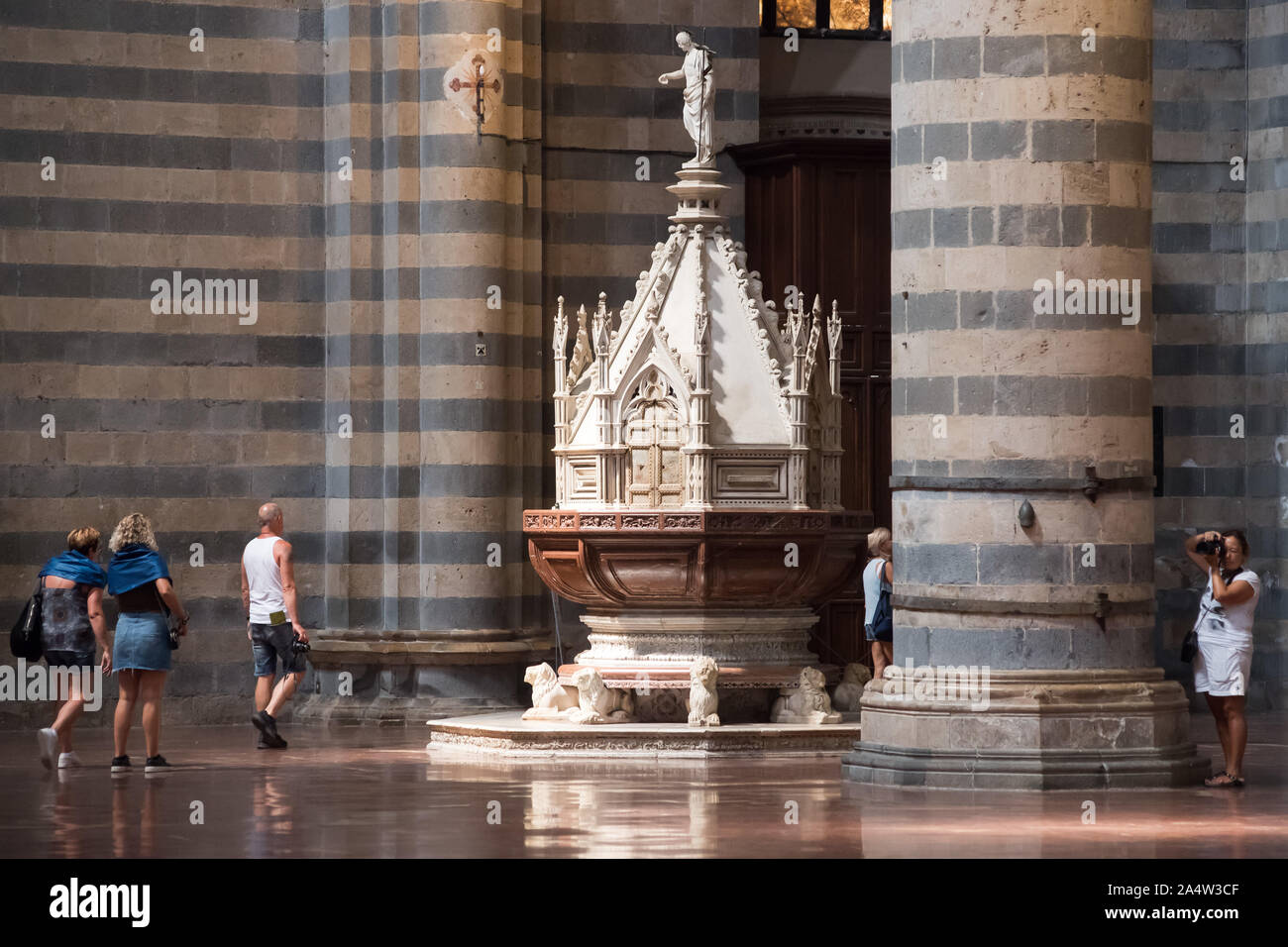 Gothic marble baptismal font with lions of Italian Gothic Cattedrale di ...