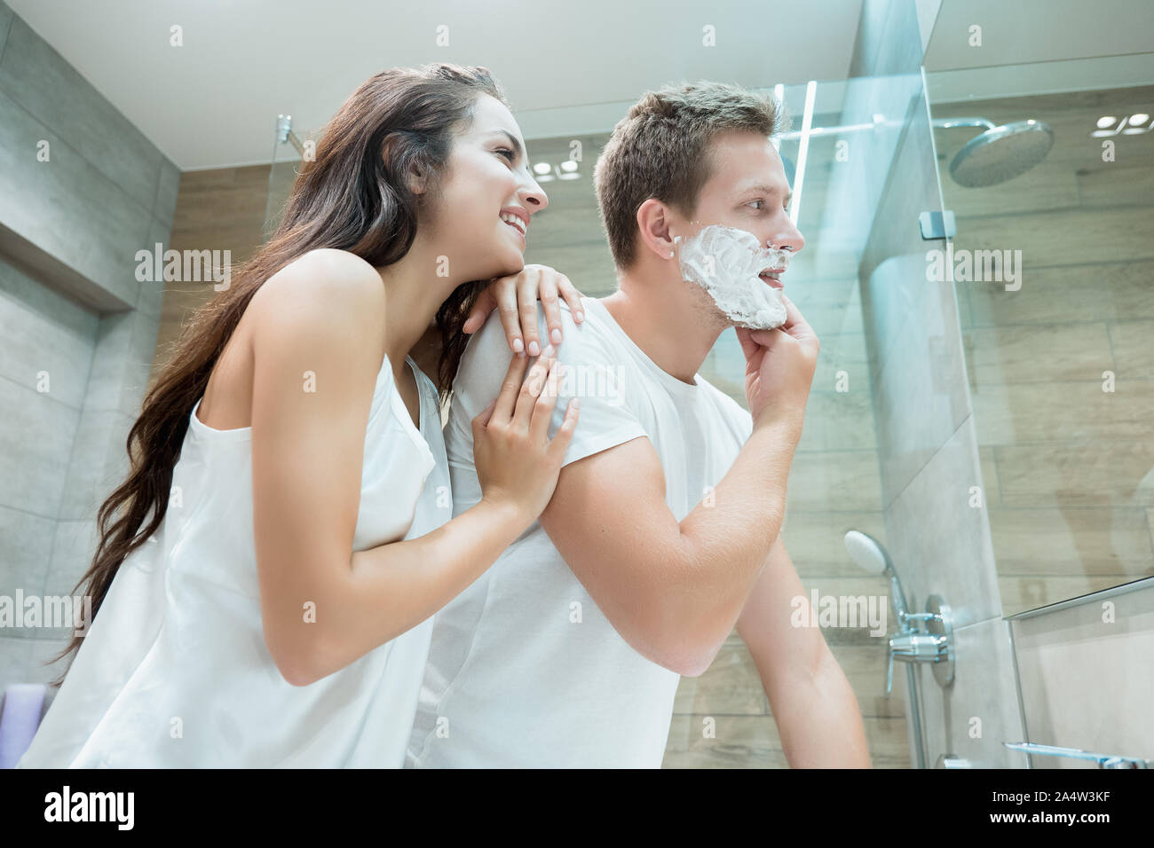 Woman on toilet with husband hi-res stock photography and images - Alamy