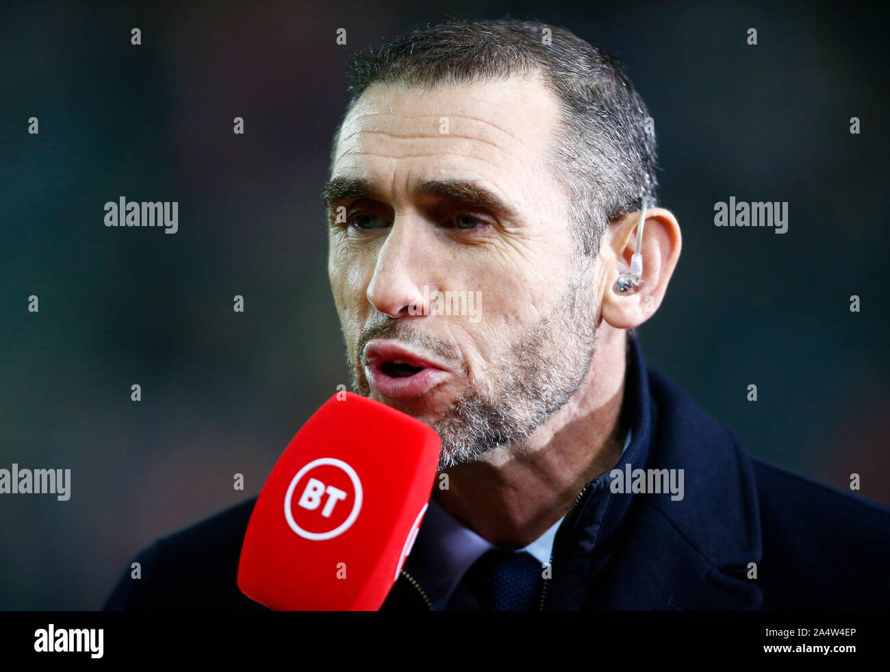 MILTON KEYNES, ENGLAND. OCTOBER 15: Martin Keown BT presenter during ...