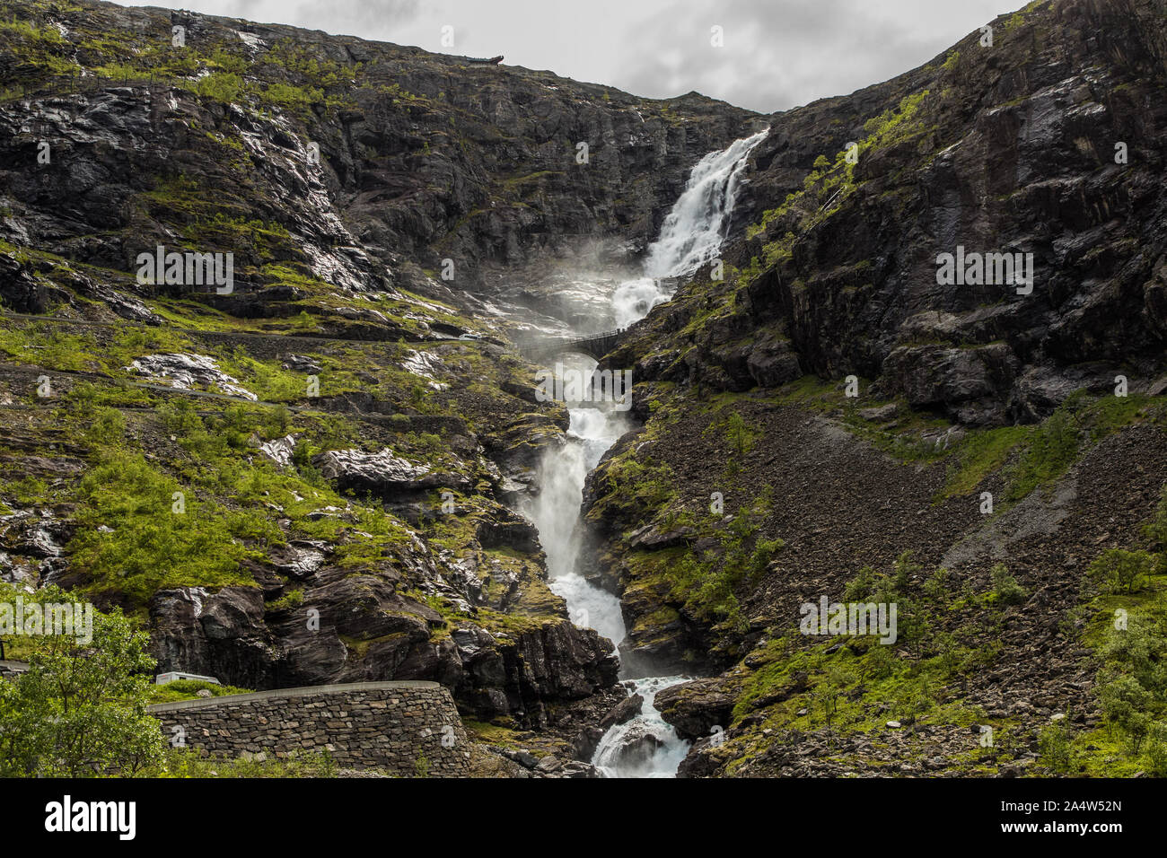 Norwegian mountain road. Trollstigen. Stigfossen waterfall. Midnight ...