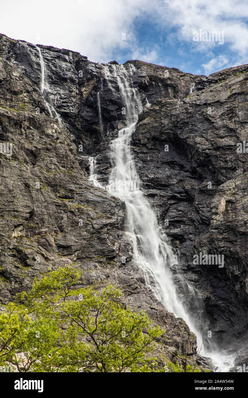 Norwegian mountain road. Trollstigen. Stigfossen waterfall. Midnight ...