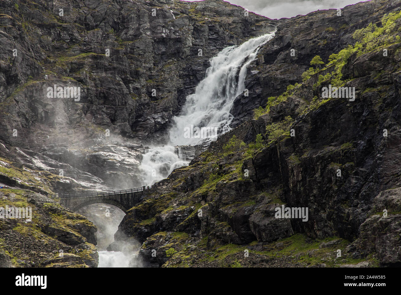 Norwegian mountain road. Trollstigen. Stigfossen waterfall. Midnight ...