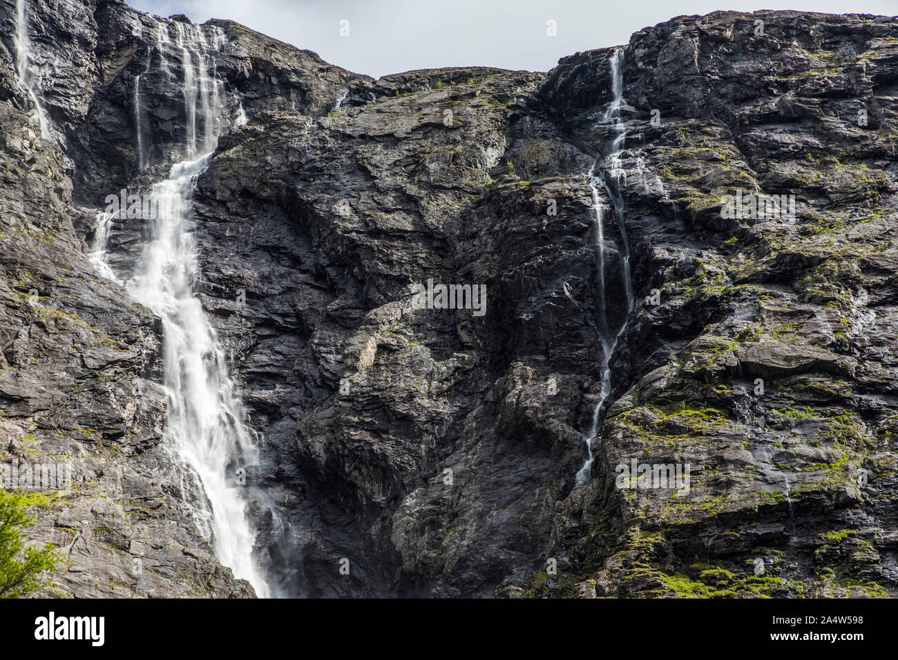 Norwegian mountain road. Trollstigen. Stigfossen waterfall. Midnight ...