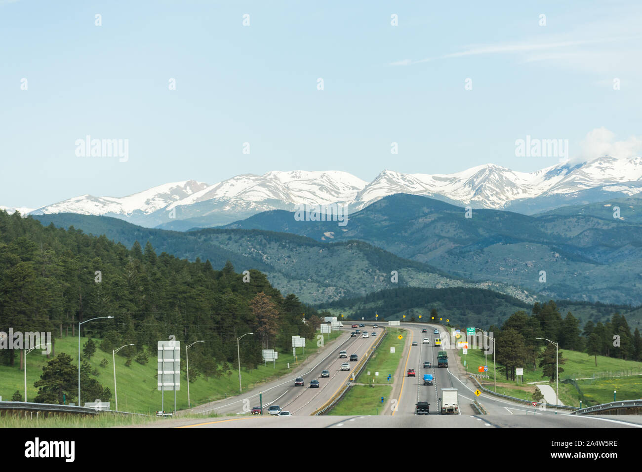 Modern interstate traffic going through Rocky Mountains, Colorado Stock ...
