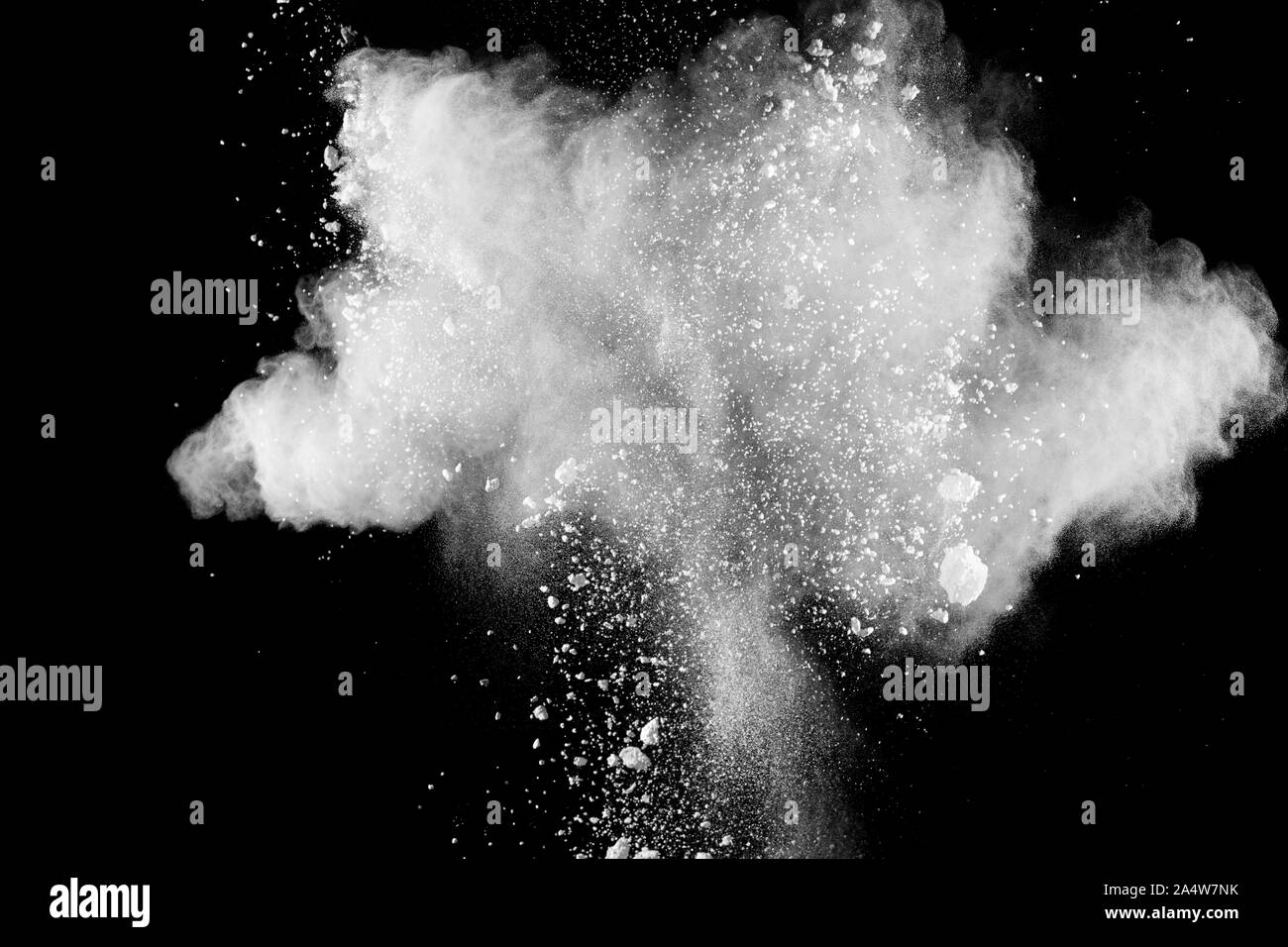 Bizarre forms of white powder explosion cloud against black background ...