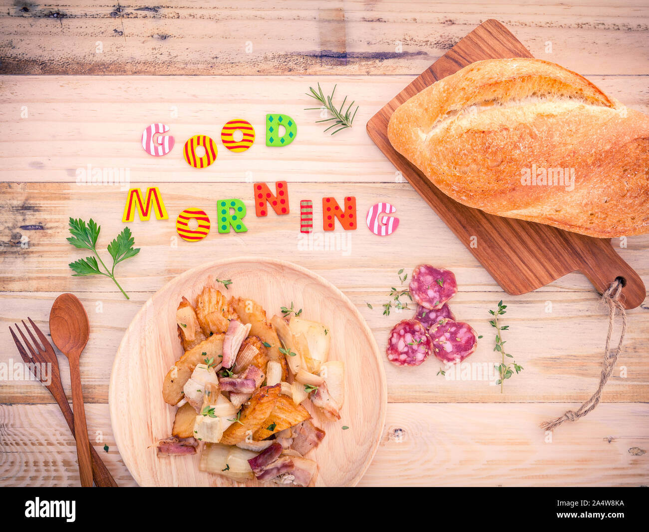 Breakfast setup on wooden table with colourful Good Morning words Stock ...