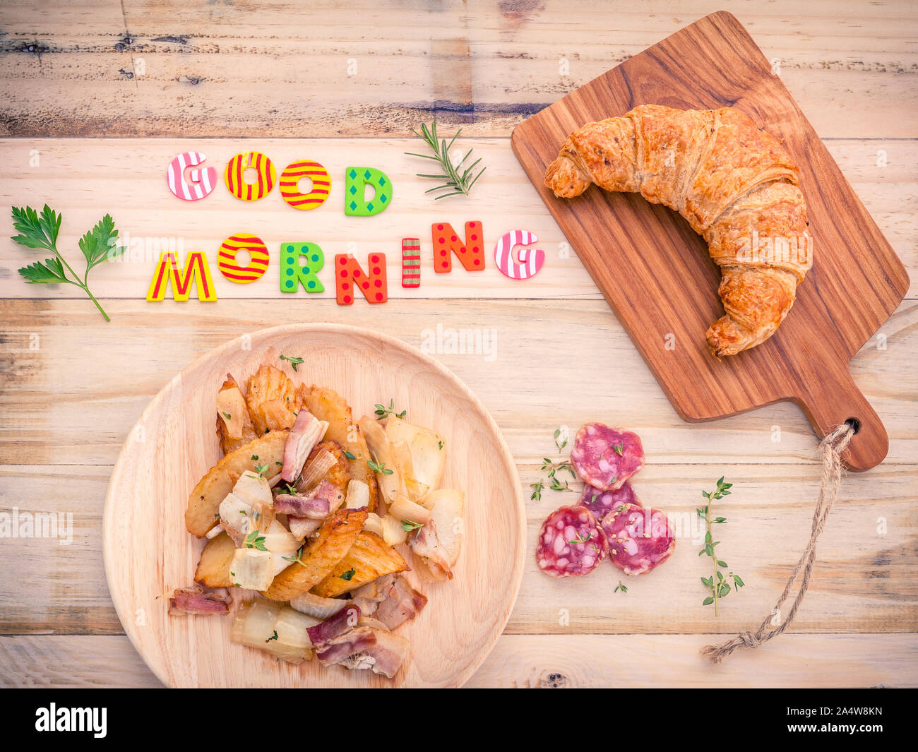 Breakfast setup on wooden table with colourful Good Morning words Stock ...