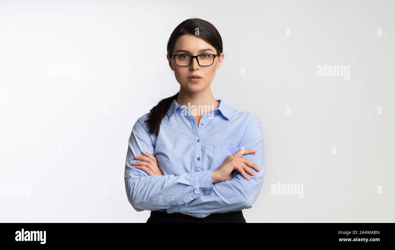 Serious Lady Standing With Crossed Hands On White Background, Panorama ...