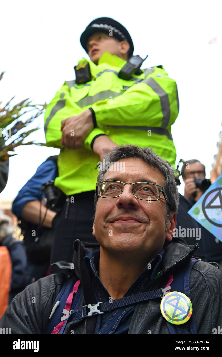 Journalist George Monbiot with police in Trafalgar Square during an ...