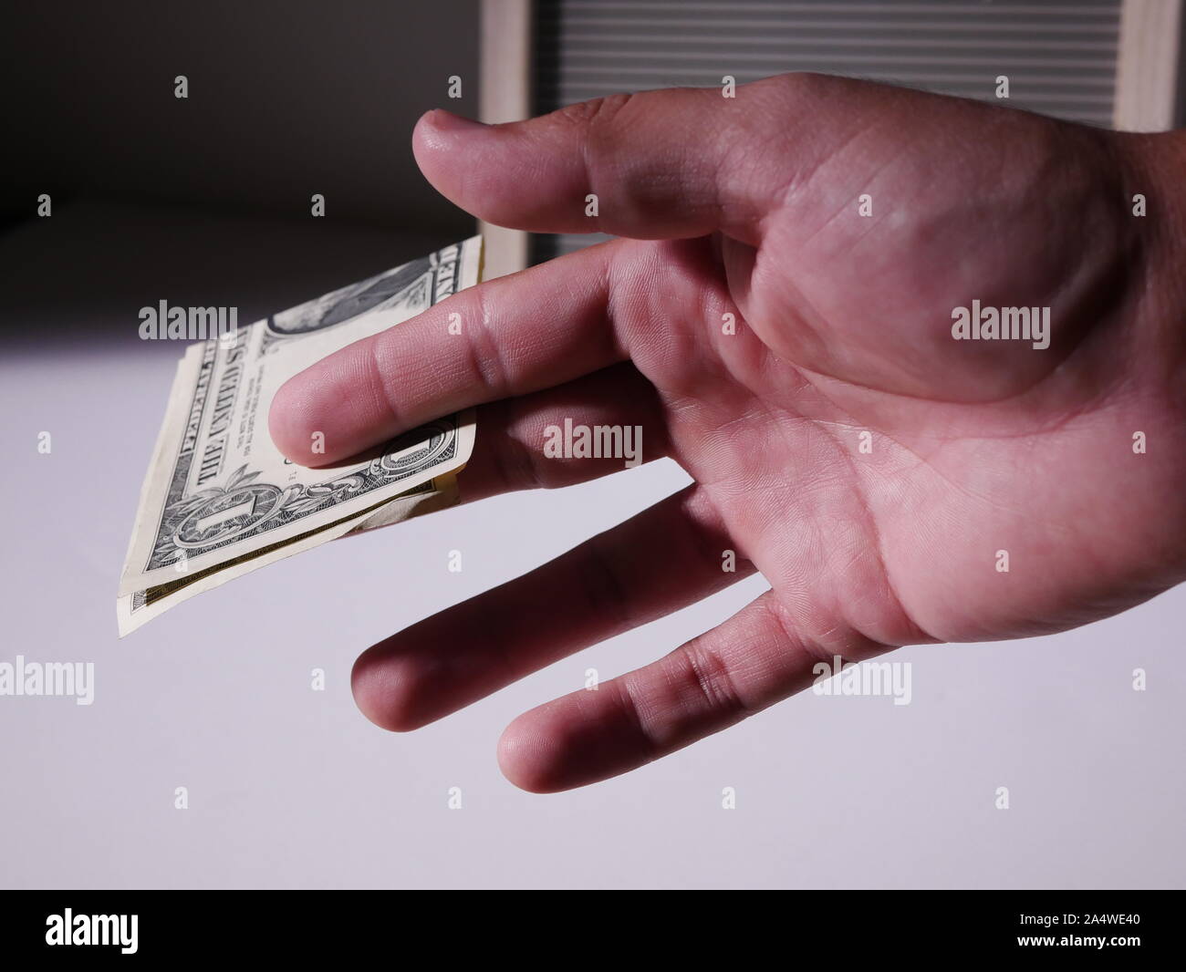 Handing over money hi-res stock photography and images - Alamy
