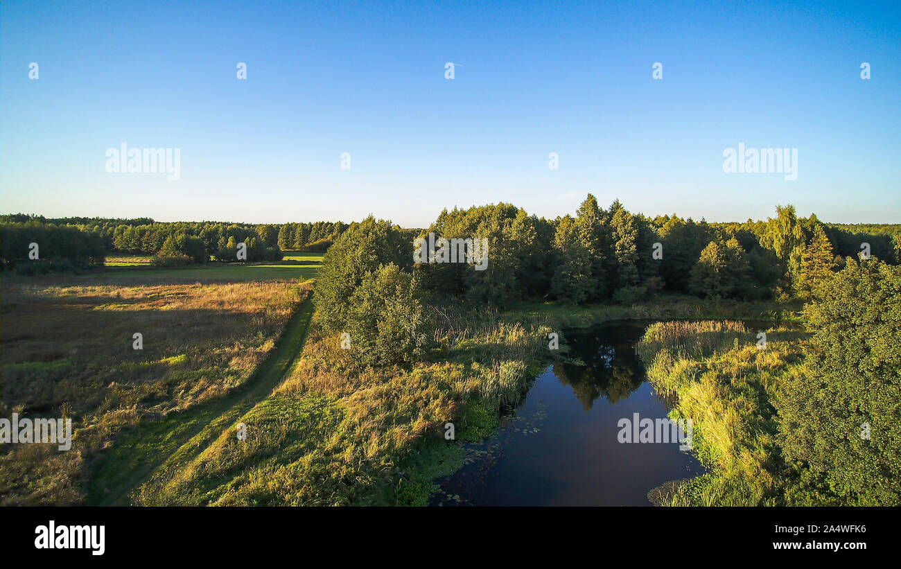 The mysterious river Grabia on a summer day, Poland, 2019 Stock Photo ...