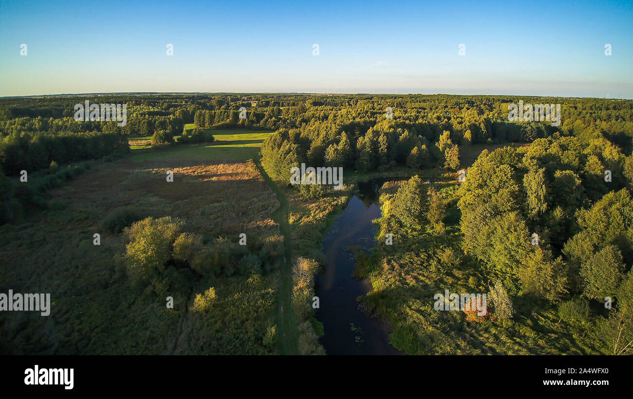 The mysterious river Grabia on a summer day, Poland, 2019 Stock Photo ...