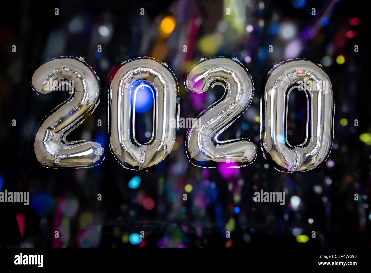 Confettis and silver balloons, new year 2020 celebration Stock Photo ...