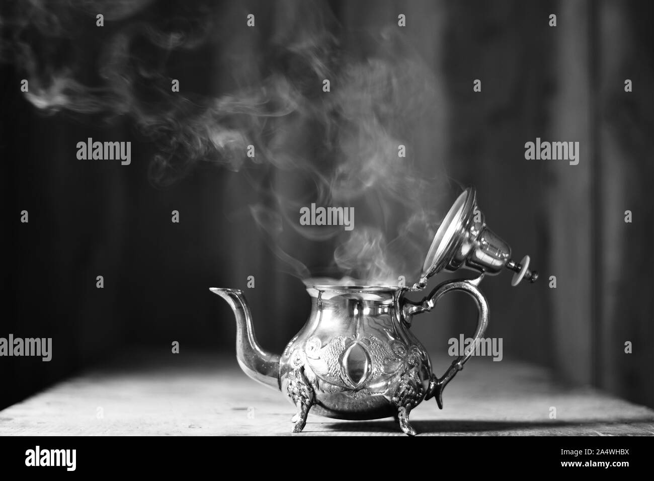 the steaming teapot Stock Photo - Alamy