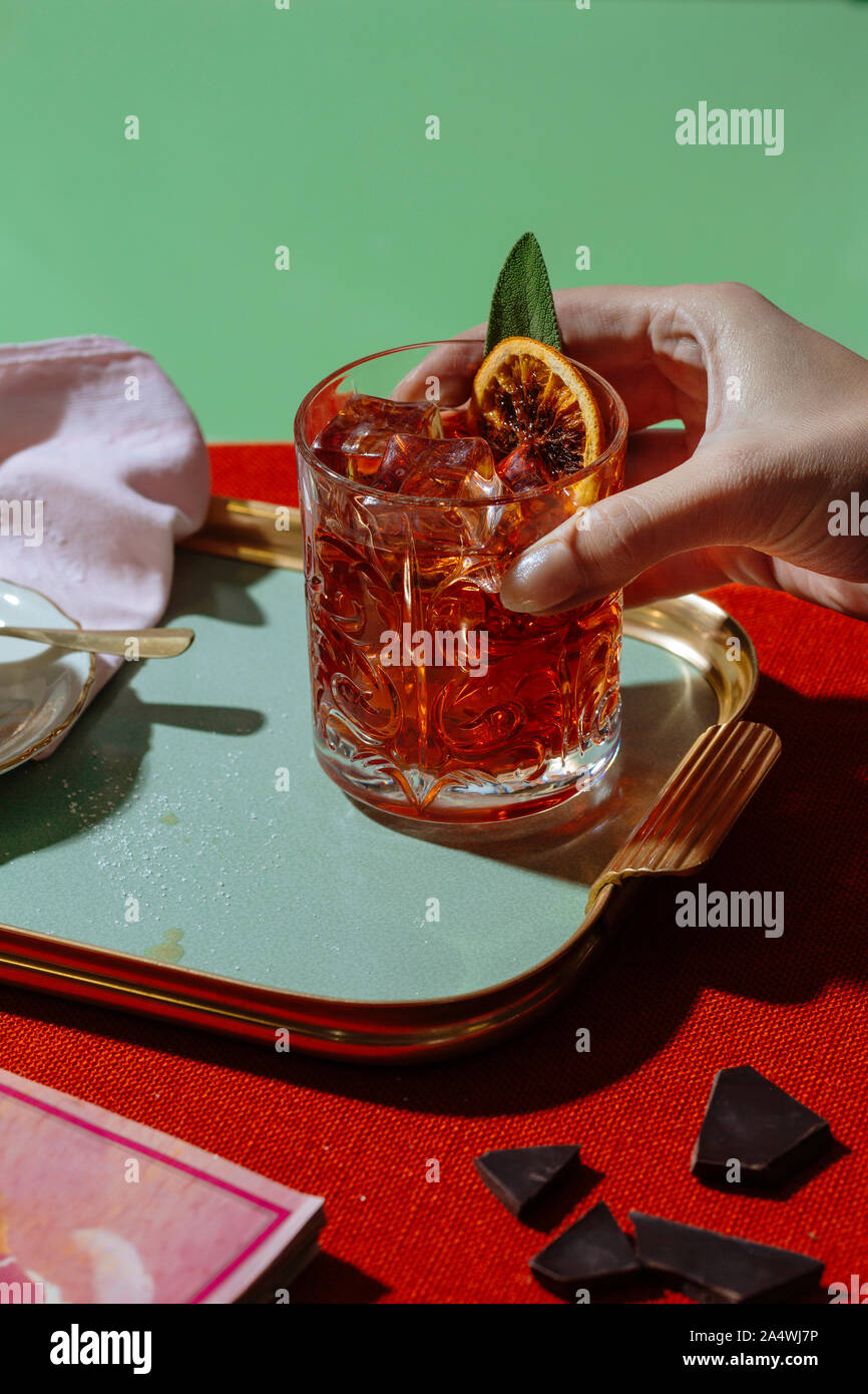 Negroni, a popular italian alcoholic aperitif cocktail, with a light ...