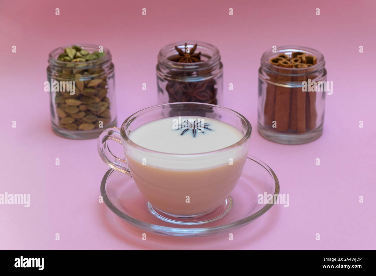 Cup of traditional indian masala tea with cinnamon, anise and cardamom ...