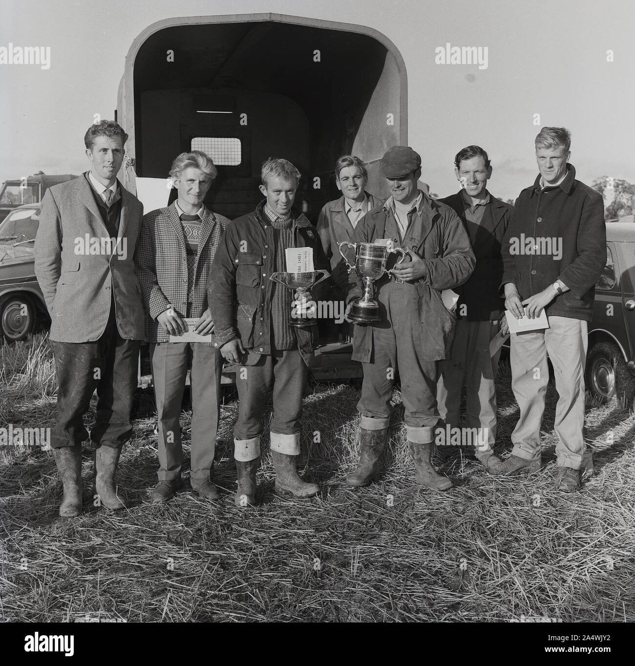 1964, historical, young male farmers, the winners standing outside with ...