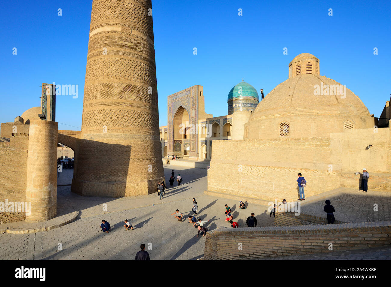 Mir-i-Arab Madrassah and Kalon minaret. Bukhara, a UNESCO World Heritage Site. Uzbekistan Stock ...