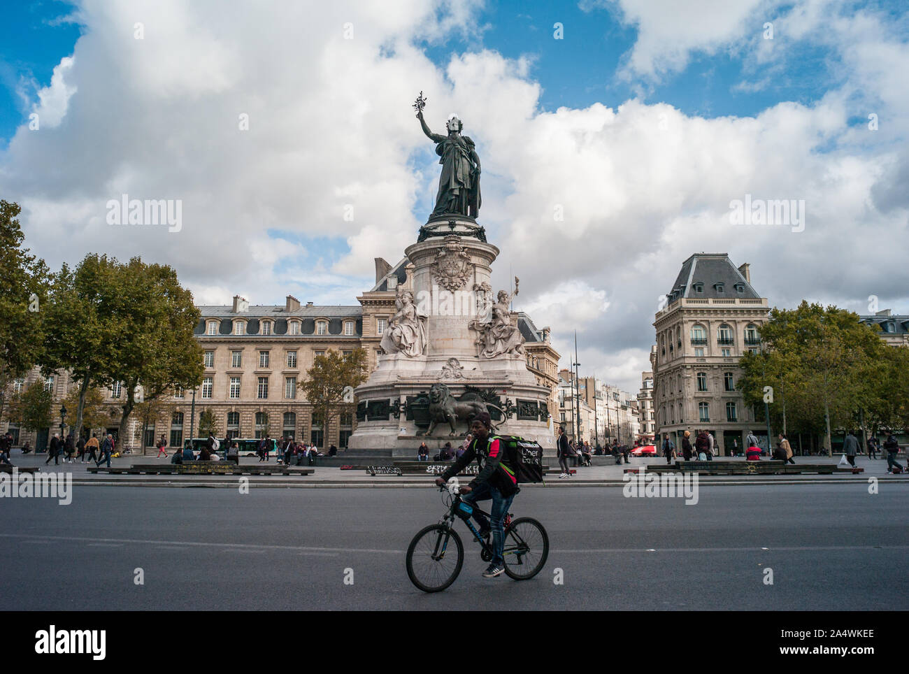 Paris, France - 3rd October, 2019: Uber eats cyclist going by Place de ...