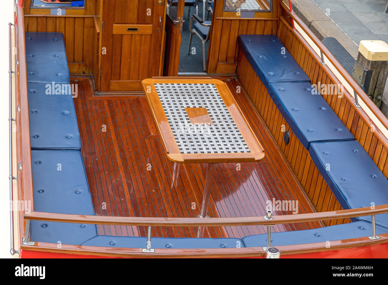 Desk and Bench Seats at Wooden Boat Deck Stock Photo - Alamy