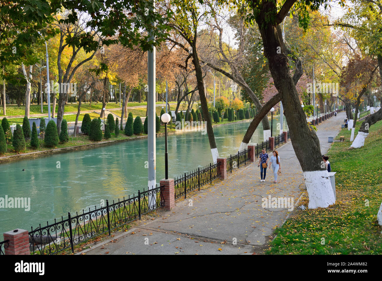 Chirchiq (Chirchik) river crossing one of the beautiful green parks in ...