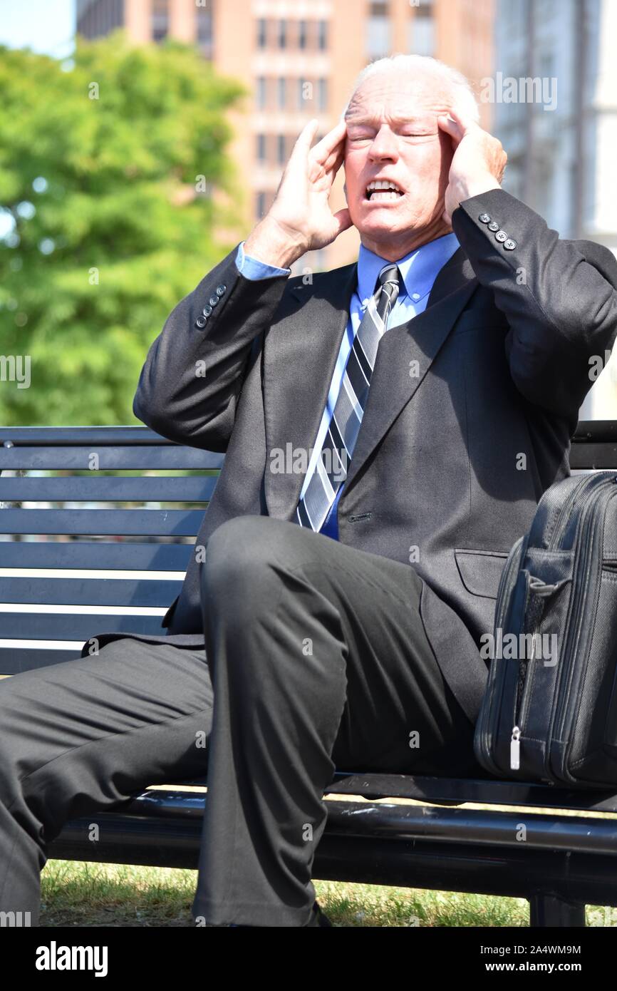 Stressed Adult Senior Person Sitting On Bench Stock Photo - Alamy