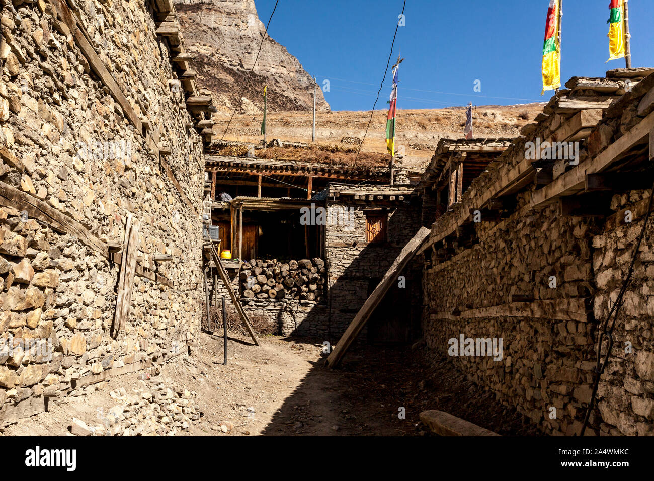 Narrow street in Manang - mountain village in Nepal. Himalayas ...