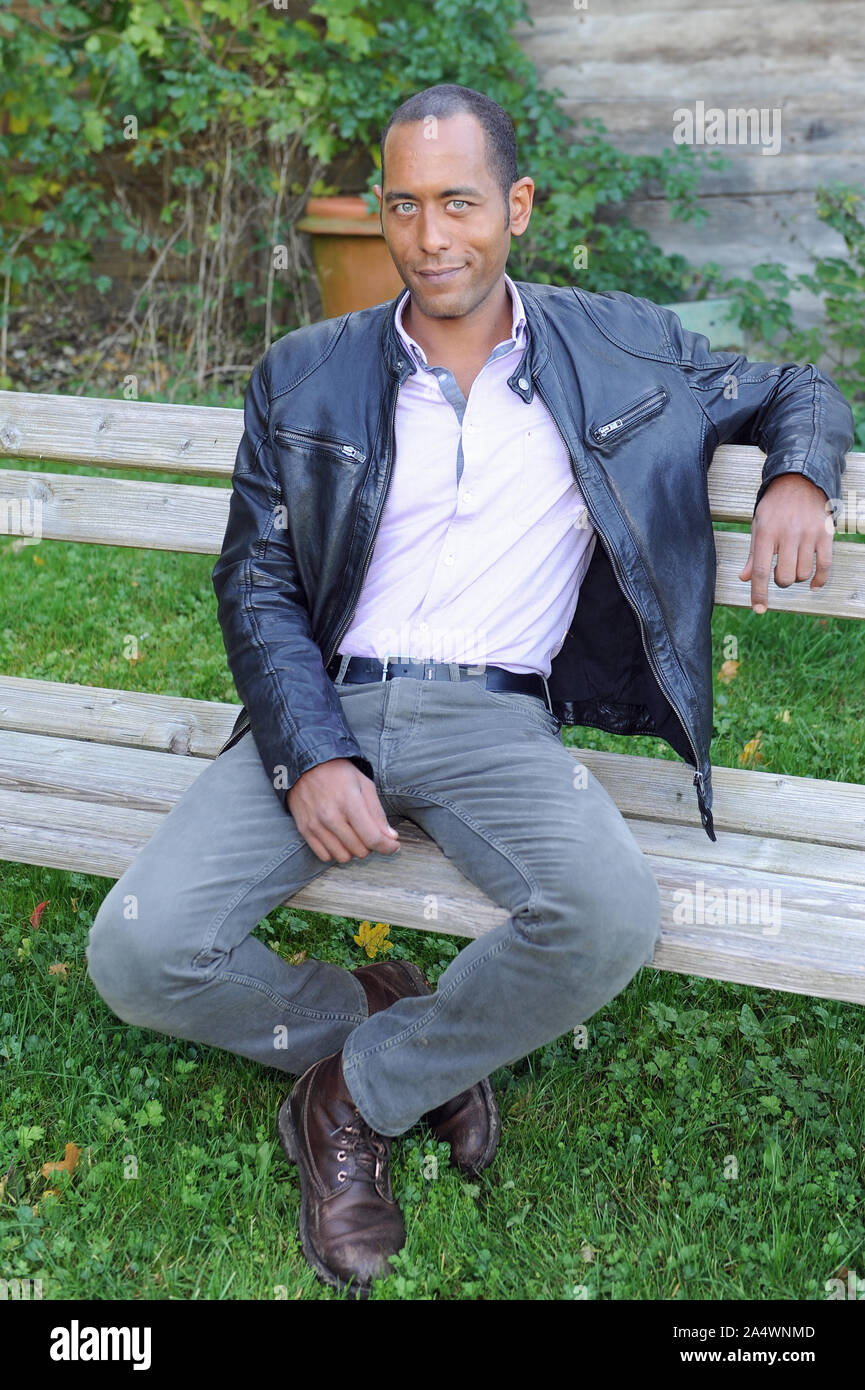 Munich, Germany. 16th Oct, 2019. The actor Peter Marton smiles during a ...