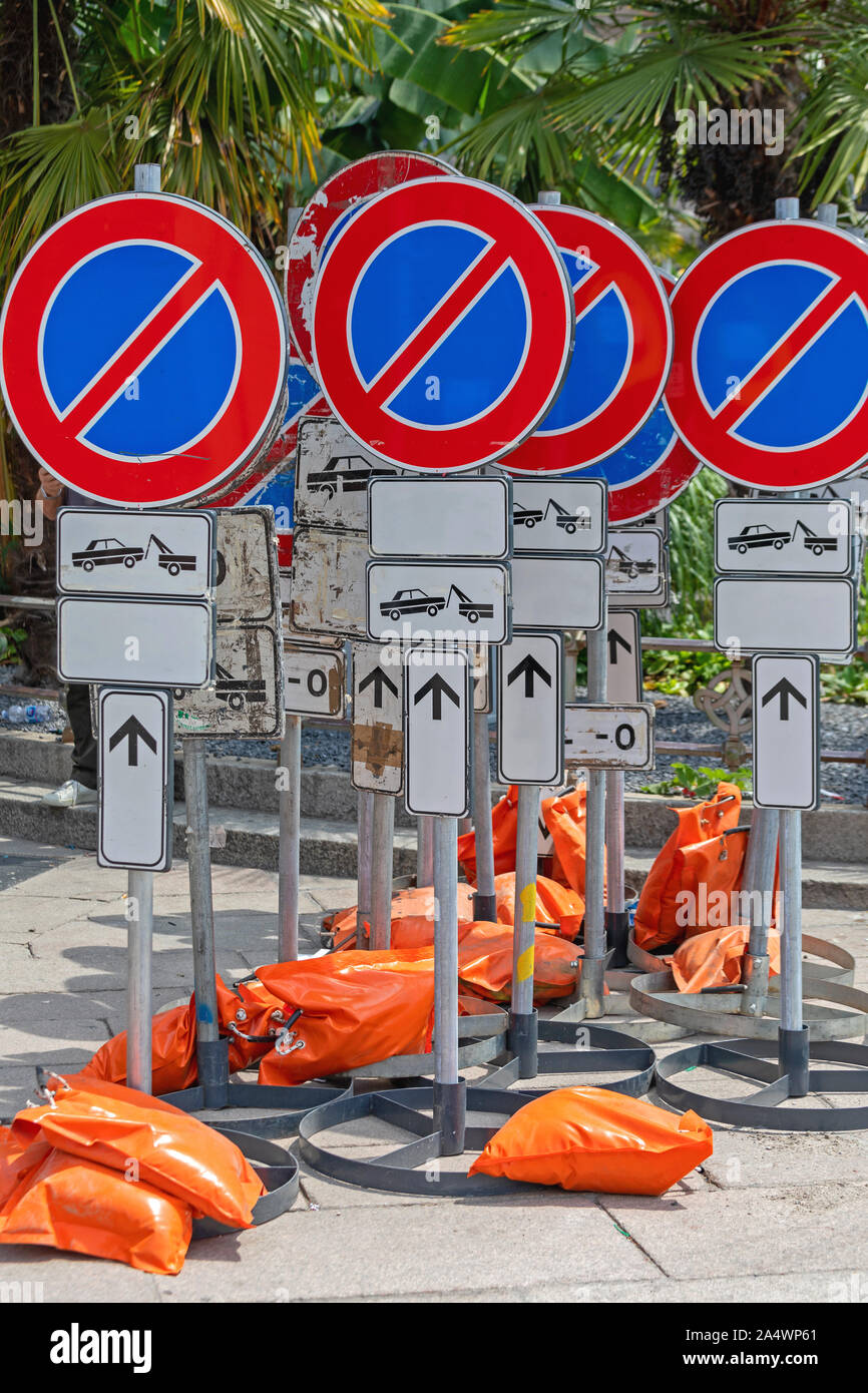 No Parking Traffic Signs Secured With Sand Bags Stock Photo - Alamy