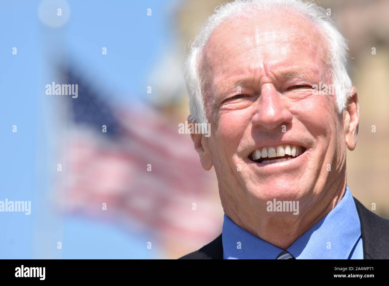 An Adult Senior Male Politician Smiling Stock Photo - Alamy