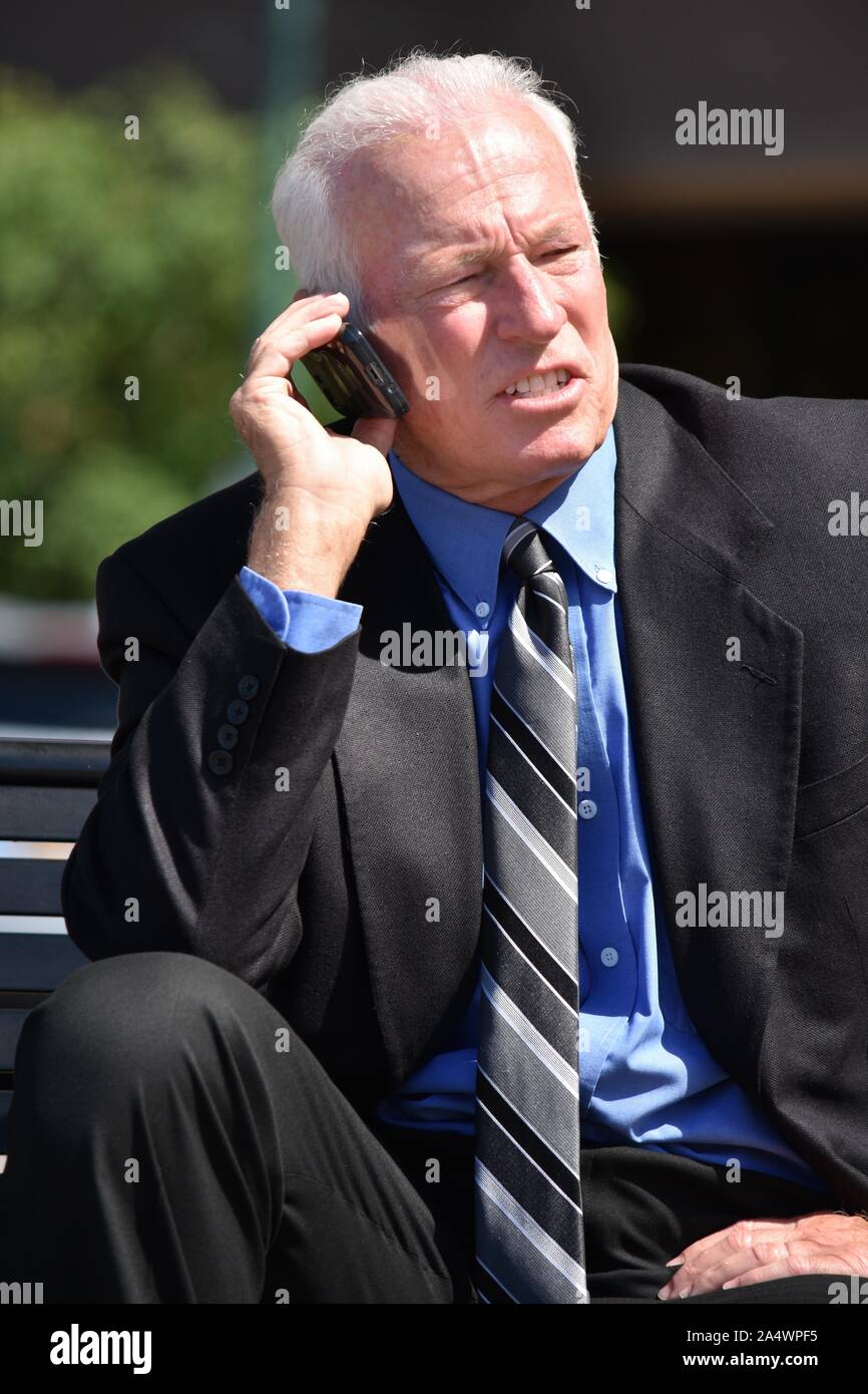 Older man using cell phone hi-res stock photography and images - Alamy
