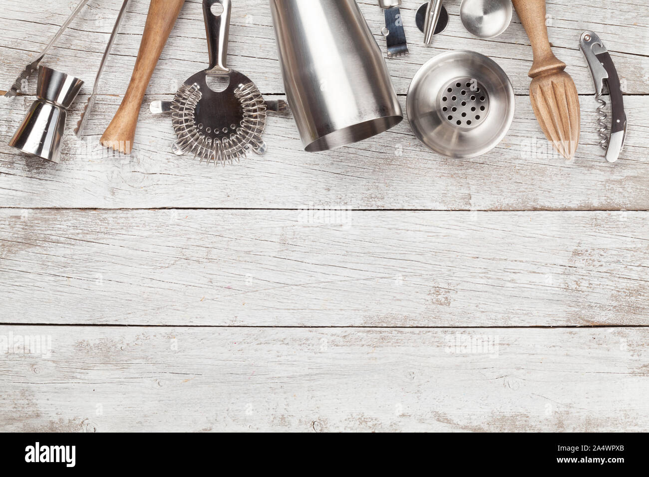 Cocktail utensils. Set of bar tools on wooden table. Top view flat lay ...