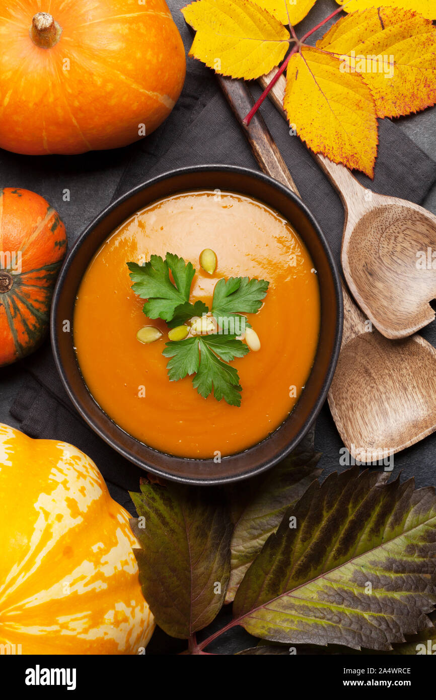Pumpkin vegetable soup on stone backdrop. Top view. Flat lay Stock ...