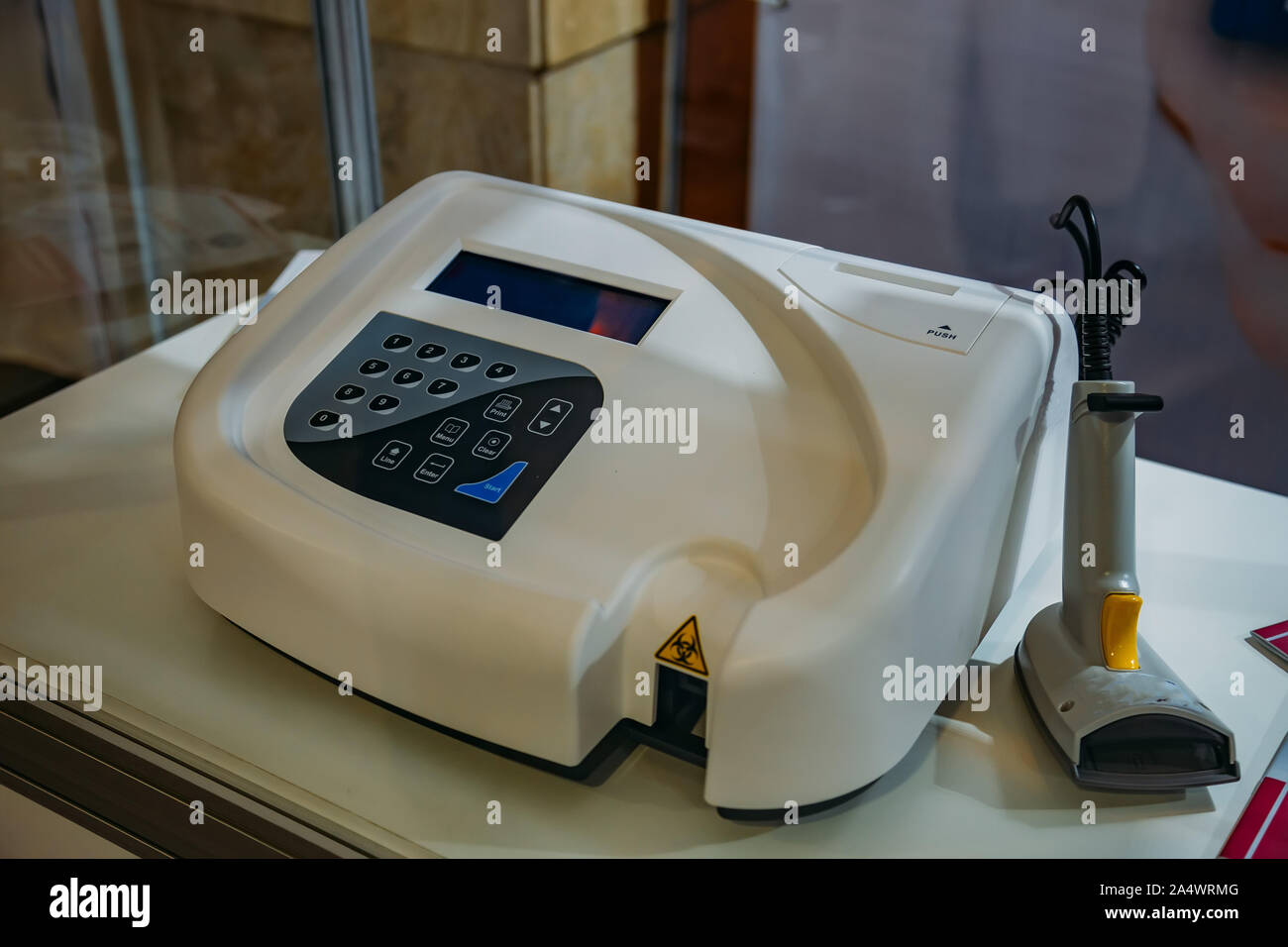 New modern digital blood express analyzing machine Stock Photo - Alamy