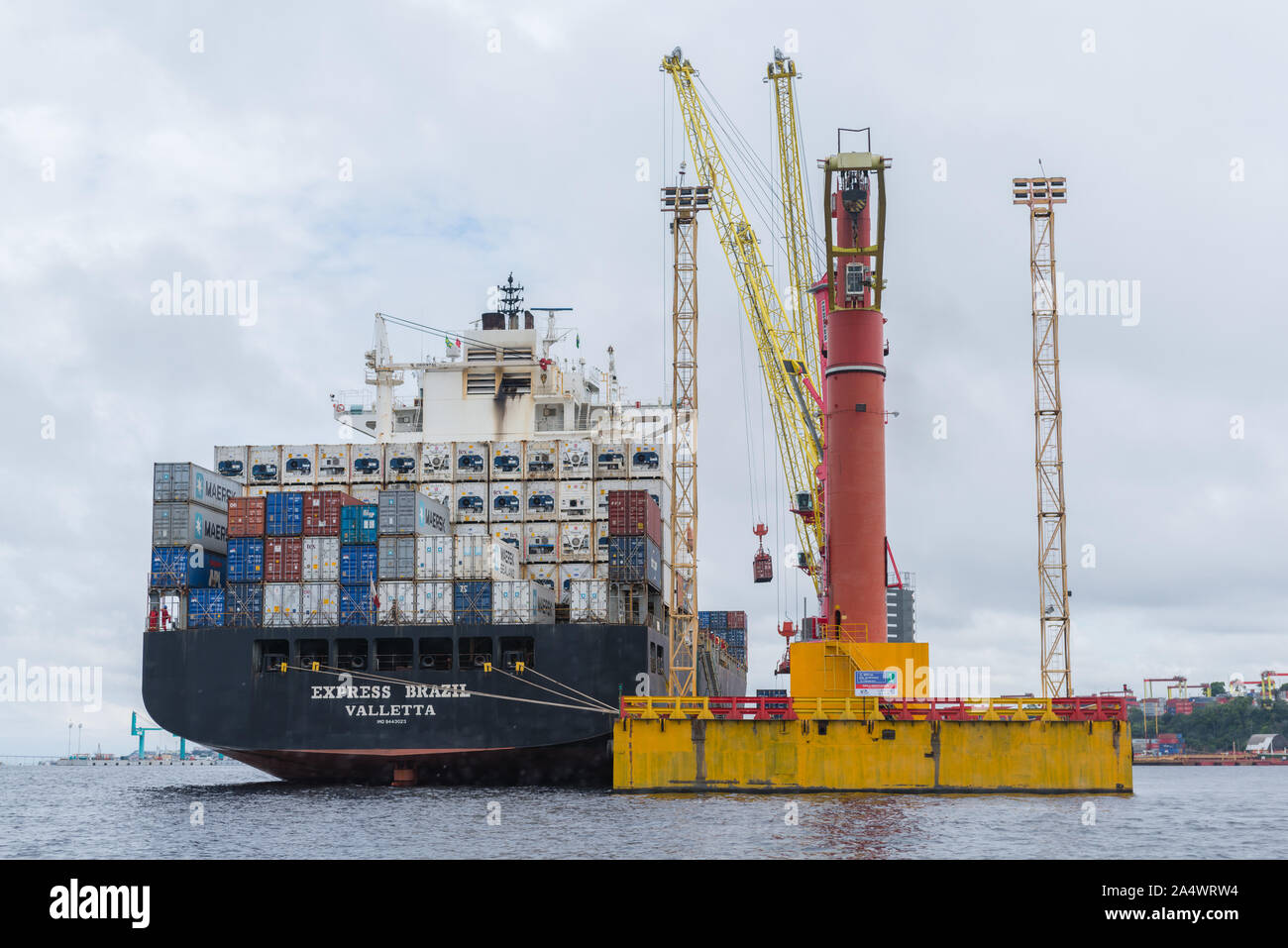 Container ship " Express Brazil" being unloaded by cranes, at a quay ...