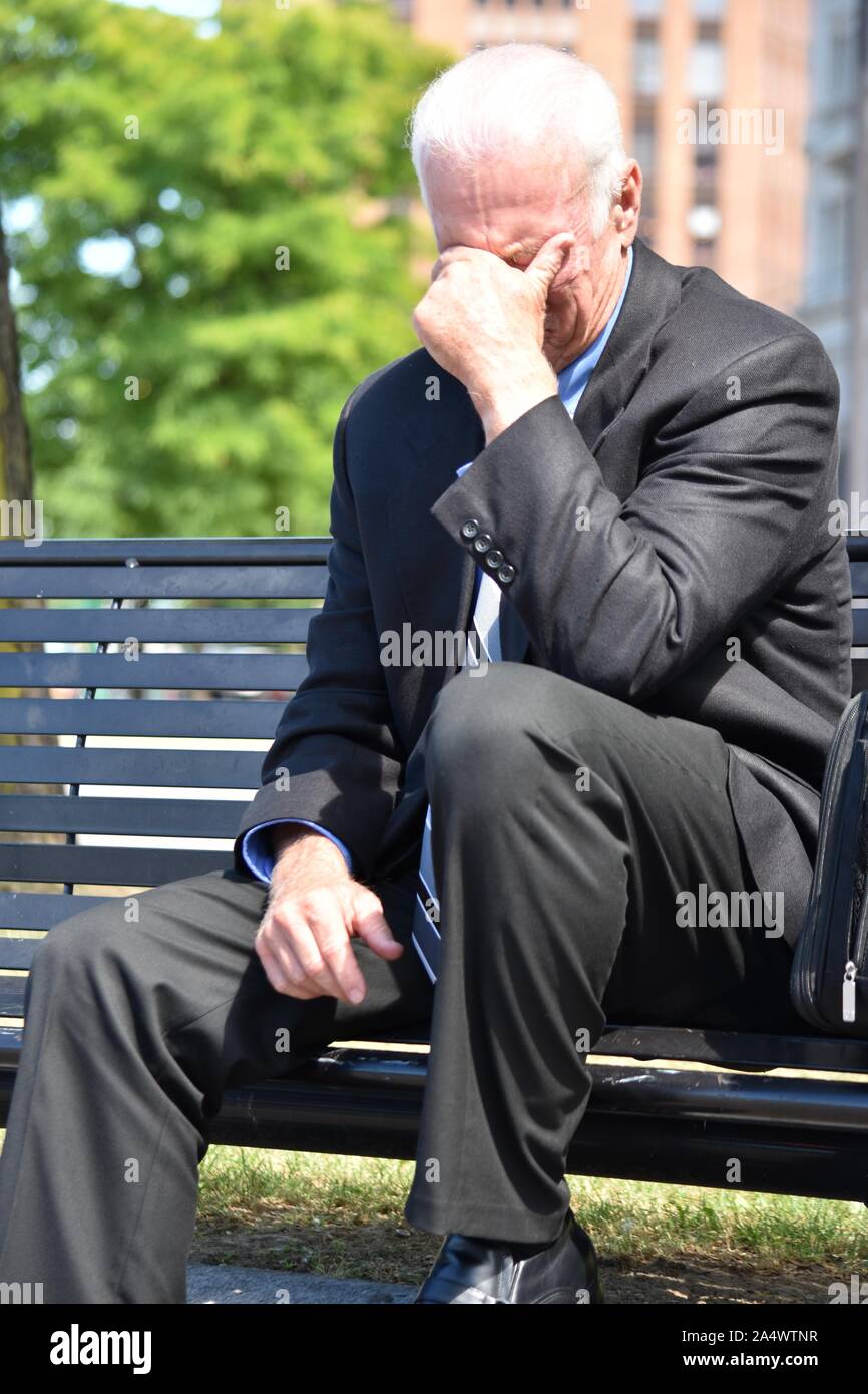 Old men sitting on benches hi-res stock photography and images - Alamy