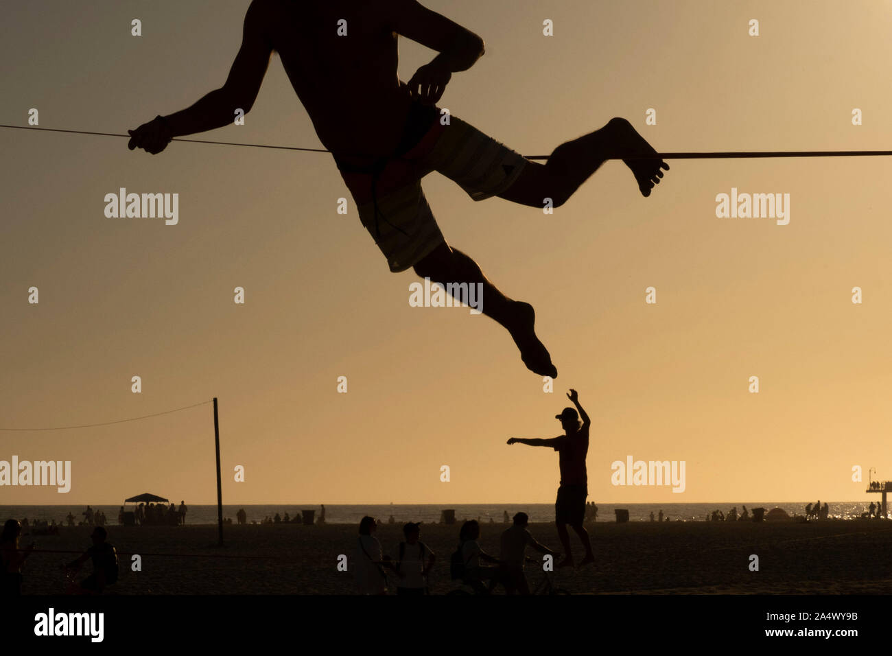 Balancing on a slackline, beach, Santa Monica, Los Angeles, California ...