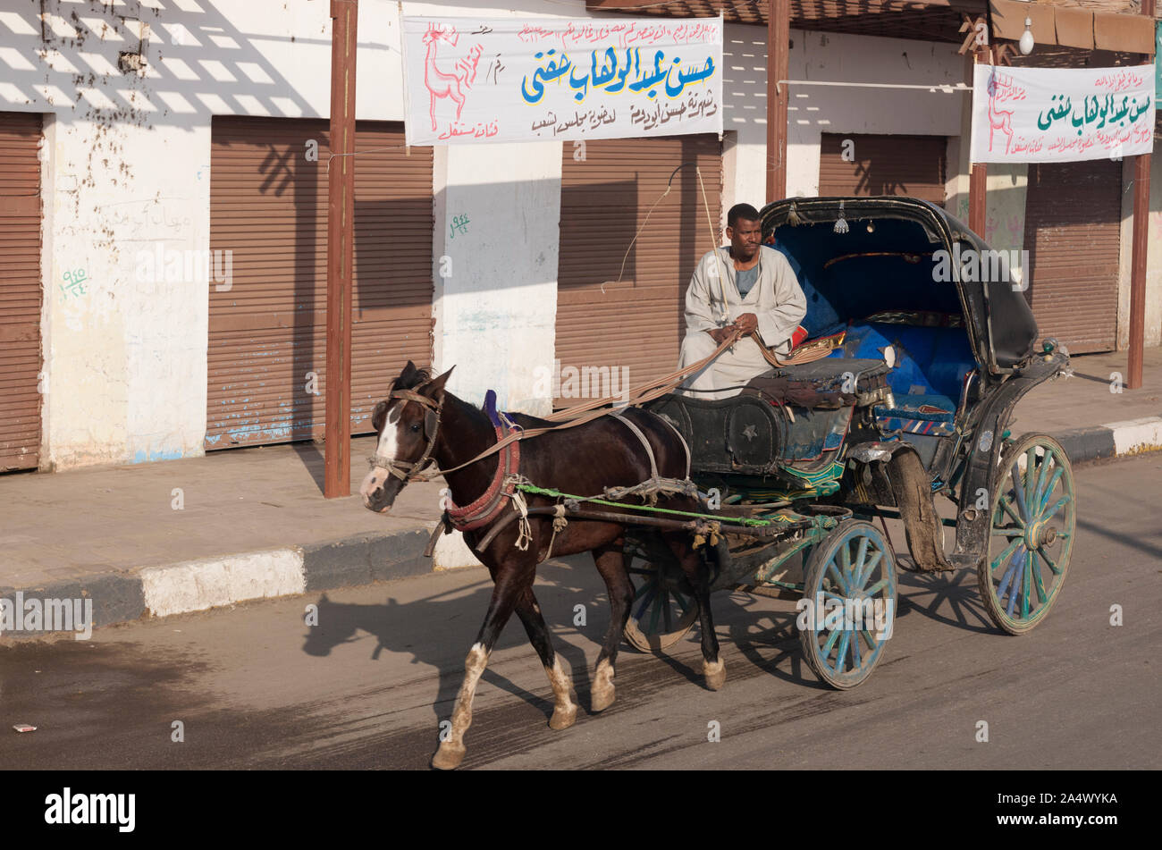 Traditional horse drawn taxi waiting for passengers - tourists - on the ...
