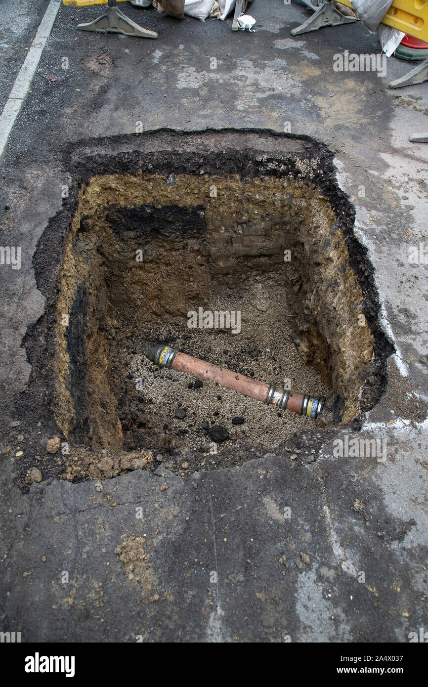 Water board repair to sewage pipe having excavated the road to access ...