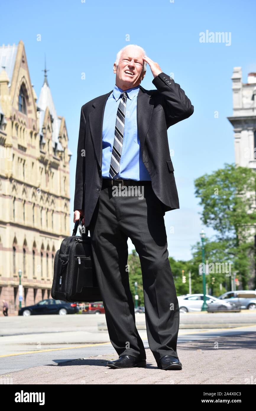 Adult Senior Investor Under Stress Wearing Suit And Tie Standing Stock ...