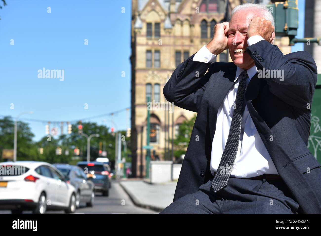 Senior Businessman Under Stress Downtown Stock Photo - Alamy