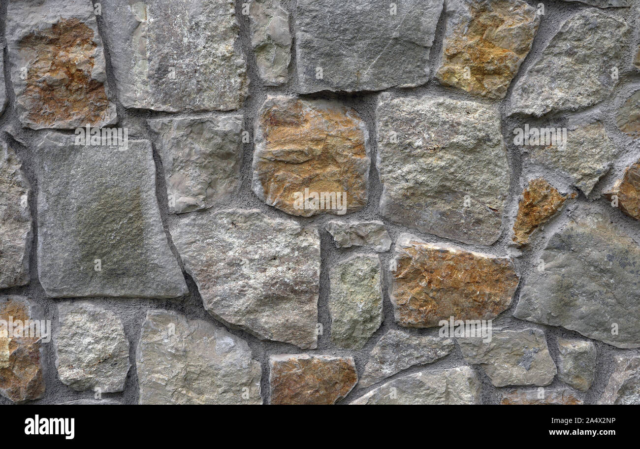 Background stone wall surface construction Stock Photo - Alamy