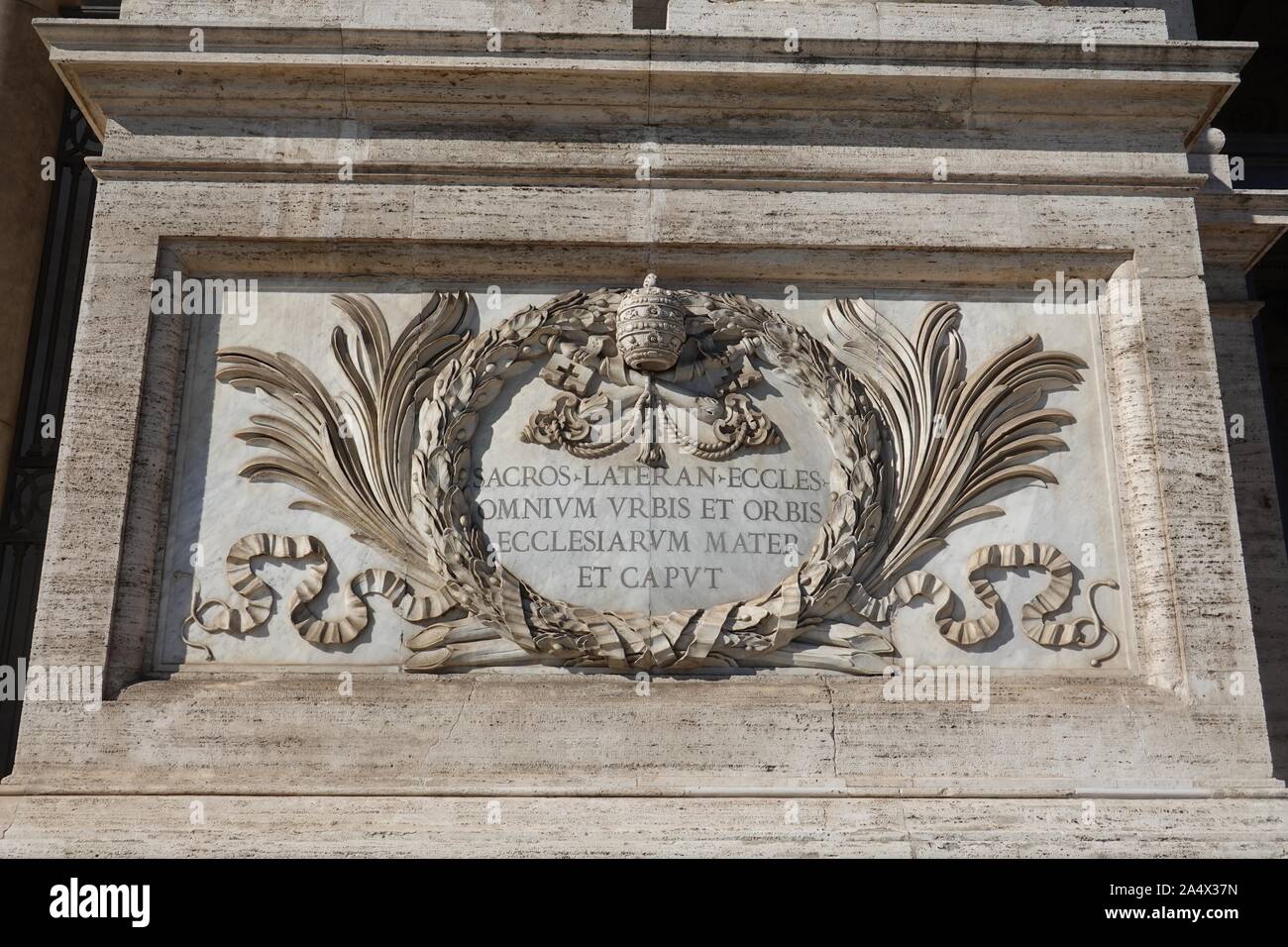 Latin inscription on the wall of St John Lateran Basilica in Rome ...