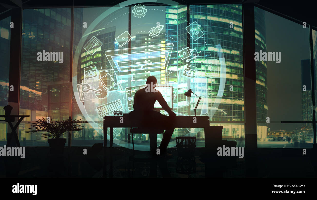 Opposite the large skyscrapers of the business center, a web designer ...