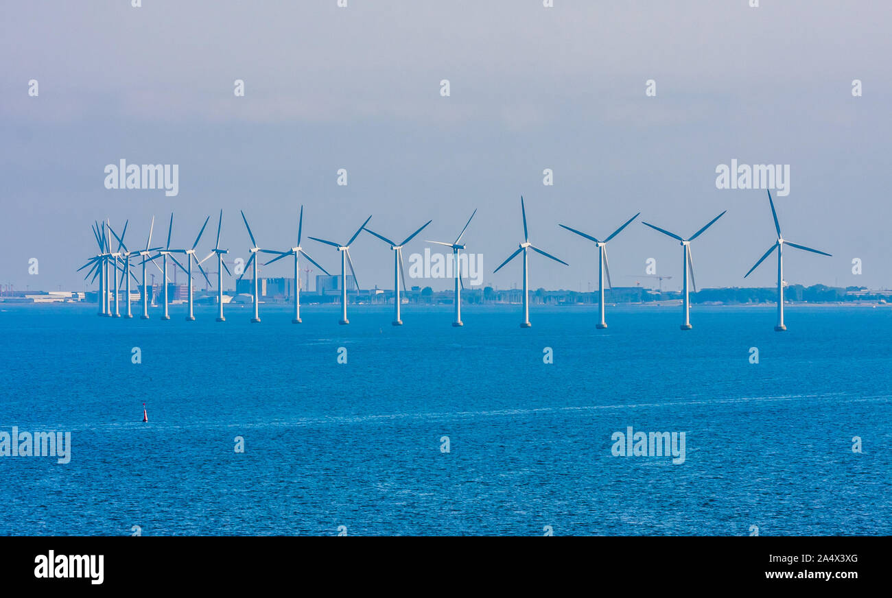 Wind turbines in sea in Copenhagen, Denmark. Offshore wind farm for ...
