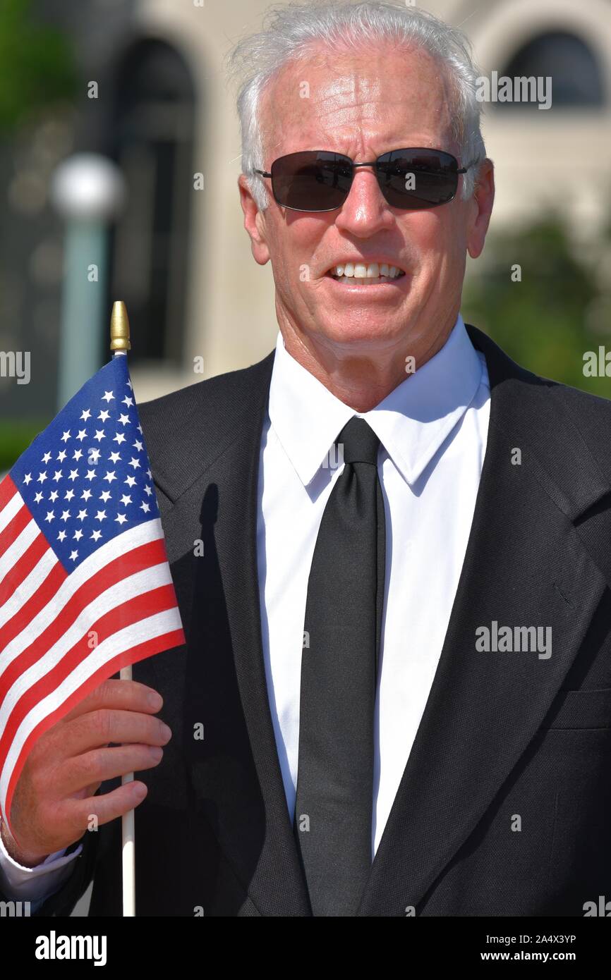 Senior Male Politician Smiling Wearing Suit With Usa Flag Stock Photo ...