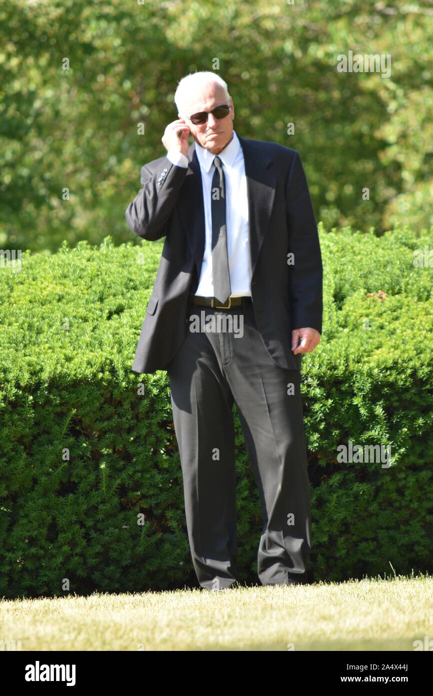 Serious Surveillance Agent Walking Stock Photo - Alamy