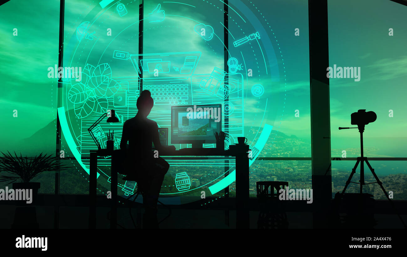 In her studio, a computer photographer girl works at a computer on the ...